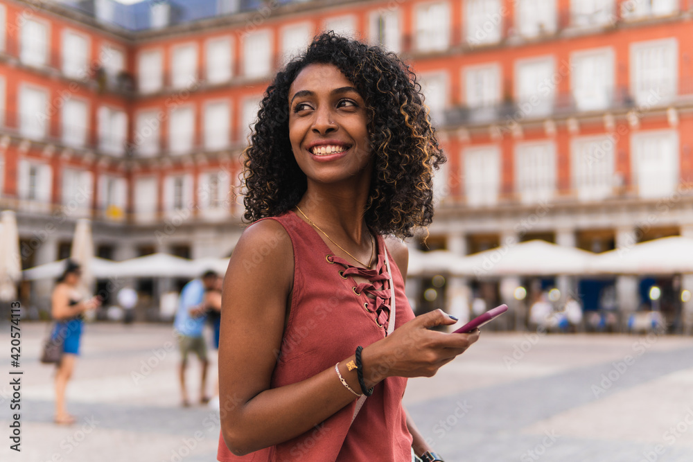 Black girl using phone Stock Photo | Adobe Stock