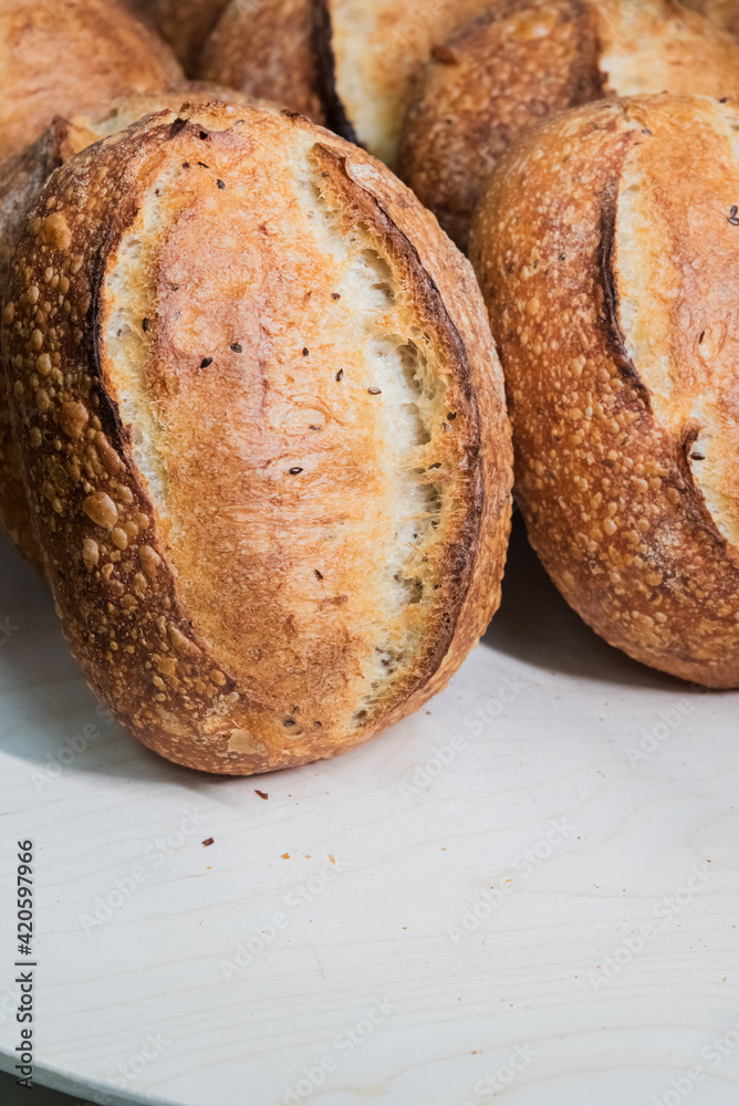 Craft bread on the table at the bakery. The concept of small industries ...