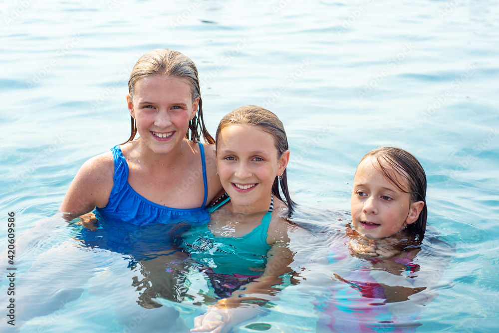 tweens in pool Stock Photo | Adobe Stock