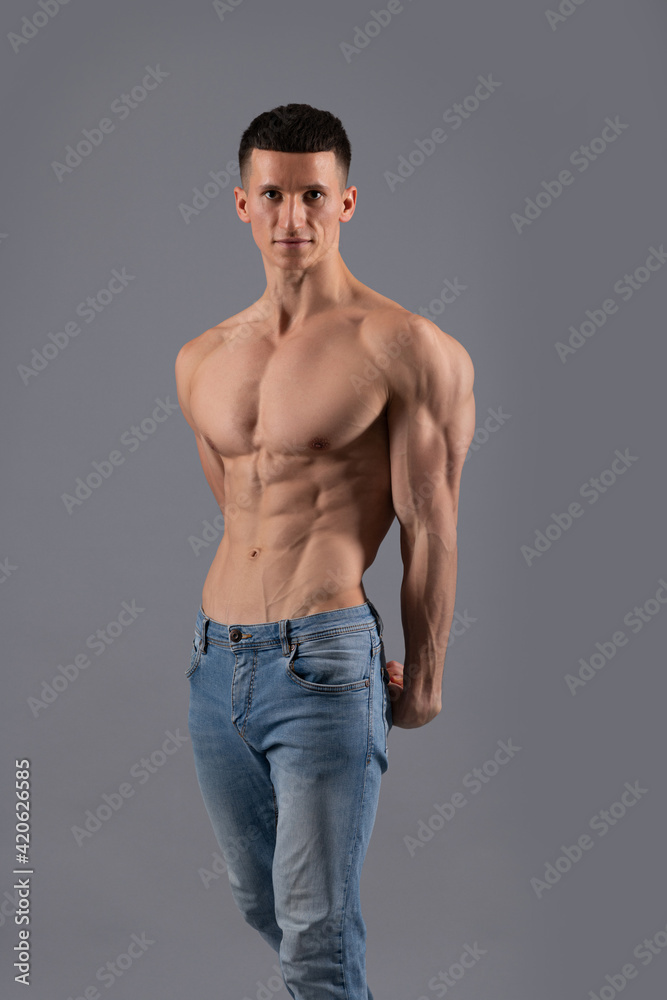 Muscle fitness. Fit man pose shirtless. Bodybuilder with muscular torso ...