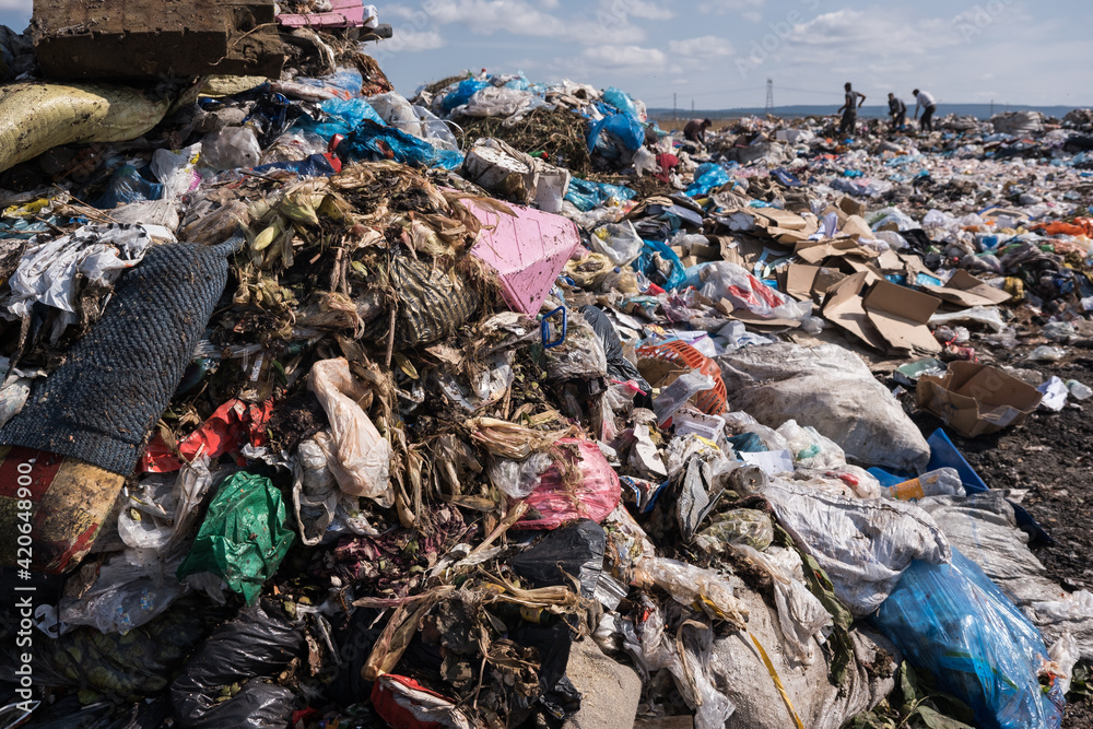 plastic pollution in landfill Stock Photo | Adobe Stock