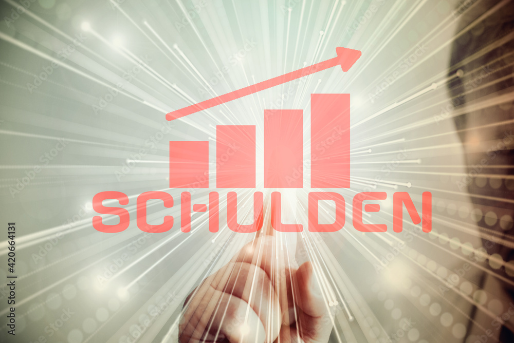 Ein Mann zeigt auf ein Diagramm Schulden Stock Photo | Adobe Stock