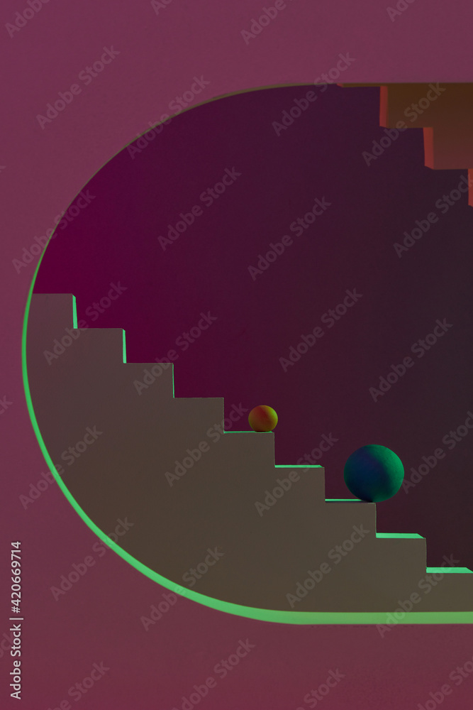 Minimalist creation of round figures and stairs on a colorfull ...