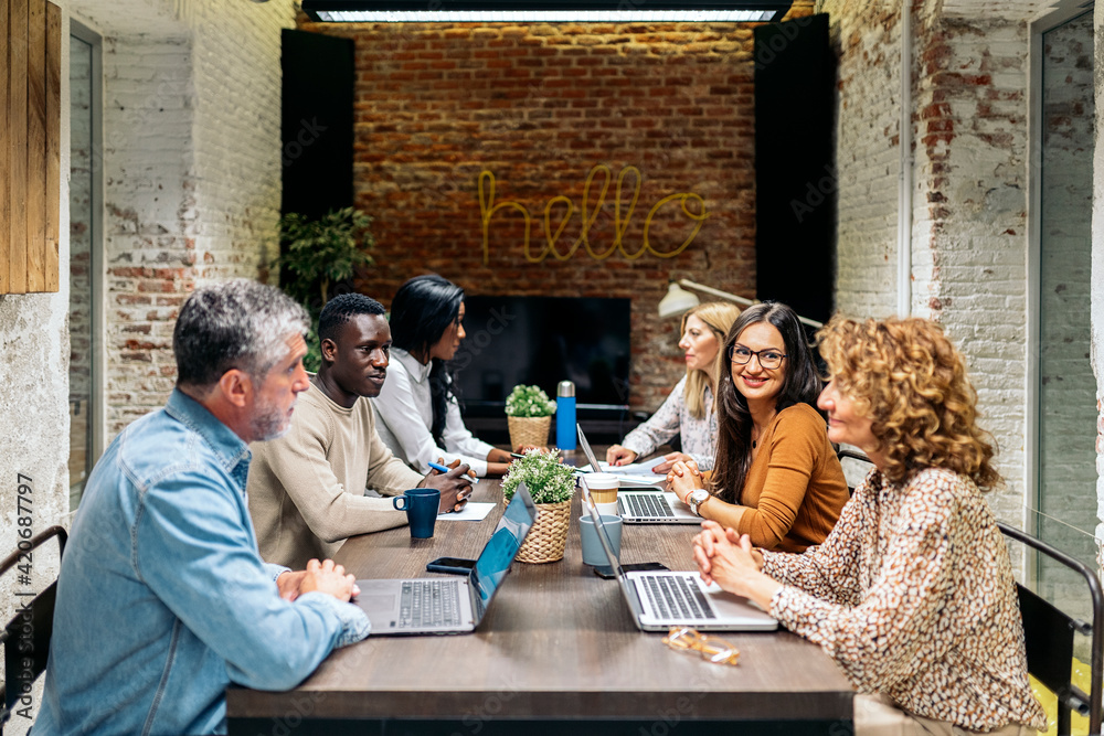 Office Workers During Meeting Stock Photo | Adobe Stock