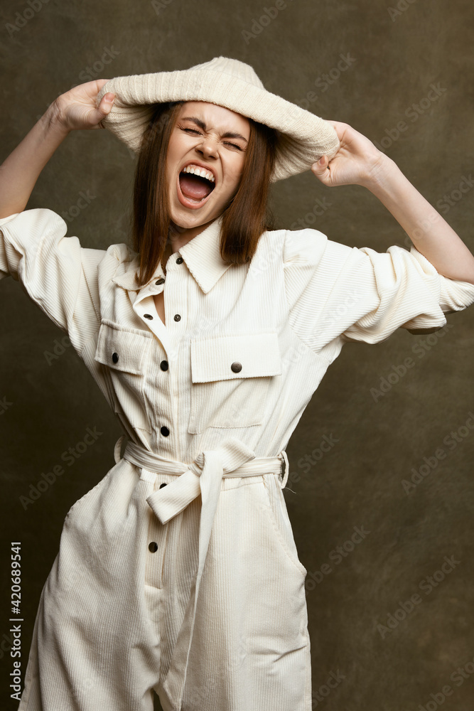 impulsive woman in white hat wide open mouth emotions aggression suit ...