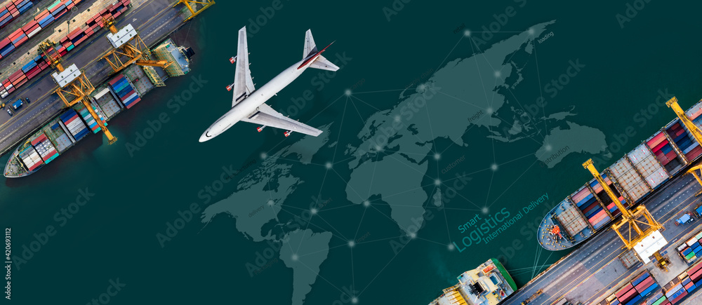 Aerial view and top view cargo plane flying above ship port in the ...