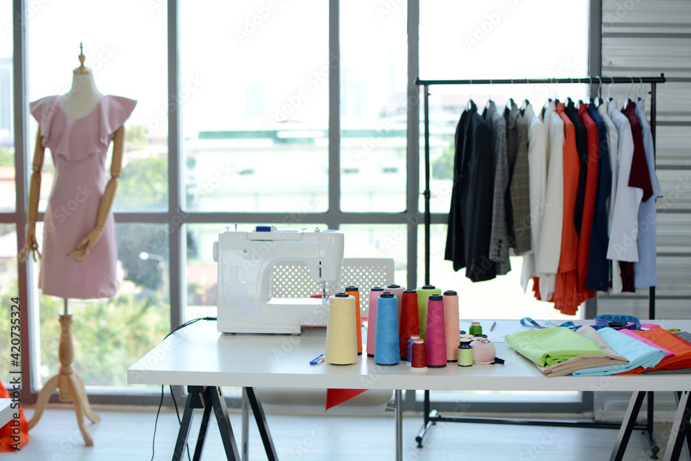 Fashion clothing design drawing and tools on designer desk. Stock Photo ...