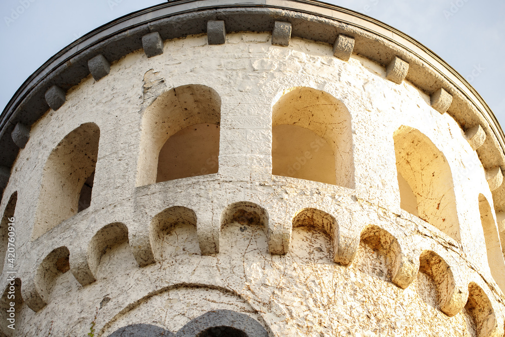 Old observation tower with six windows close-up against the sky ...