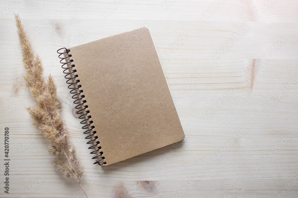 Mockup template with black blank empty notebook cover on wooden ...