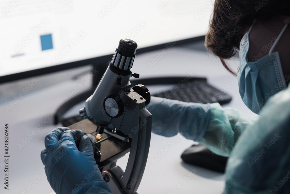 Medical female scientist working inside modern laboratory inside ...