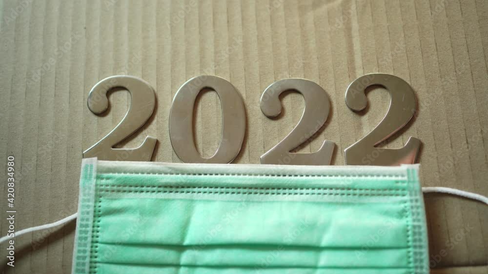 2021 and 2022 under a face mask. How long will we need to wear masks ...
