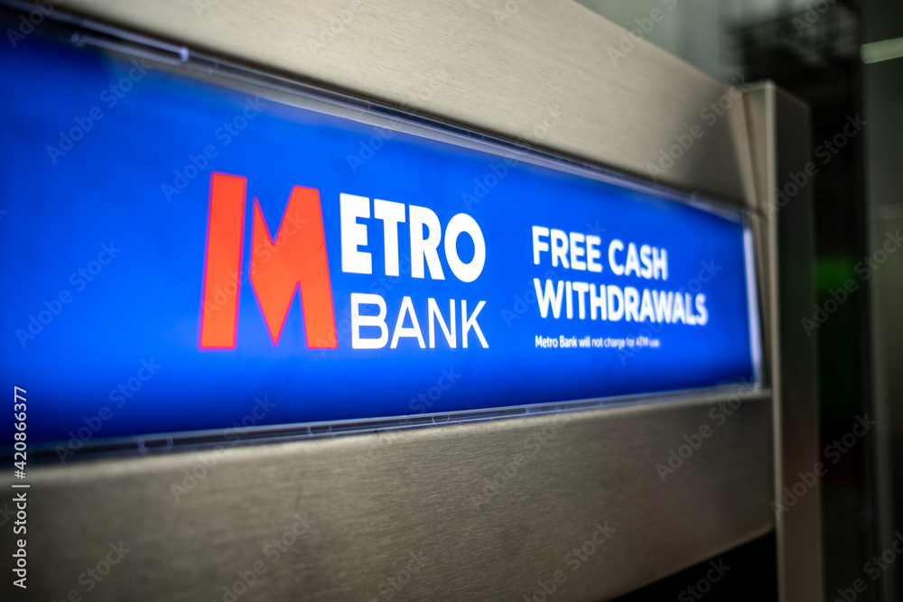 London- Metro Bank cash machine- a British high street retail ...
