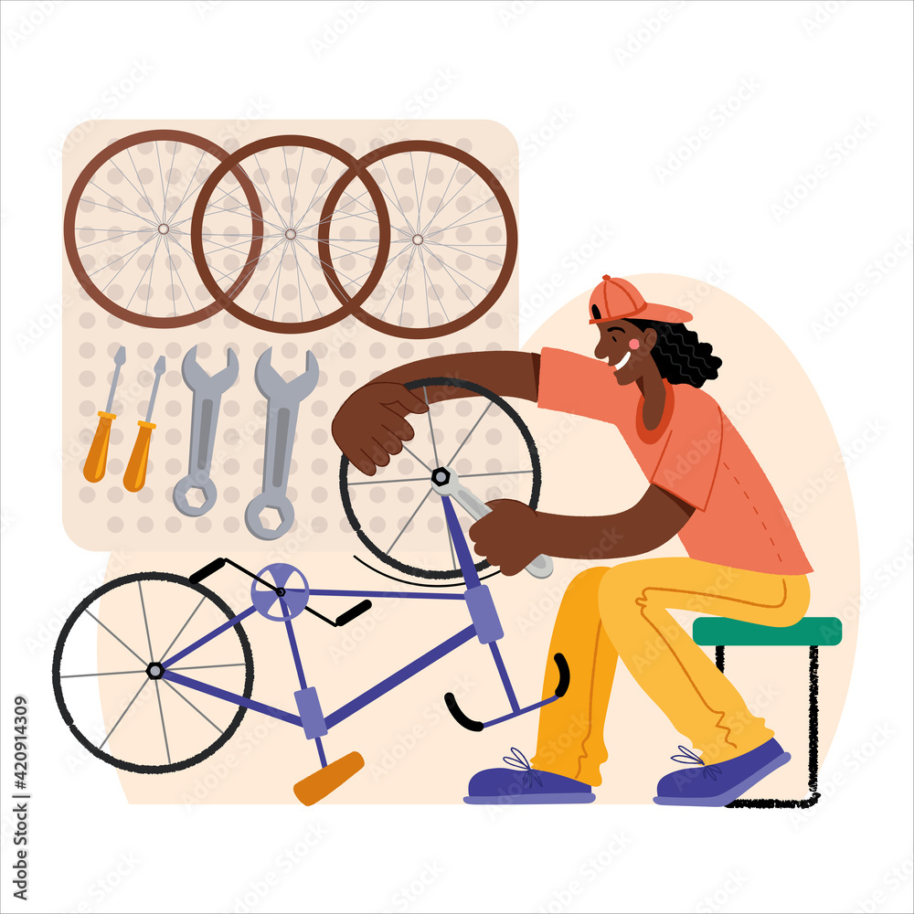 Bicycle repair. A black man repairs a bicycle. The mechanic repairs the ...