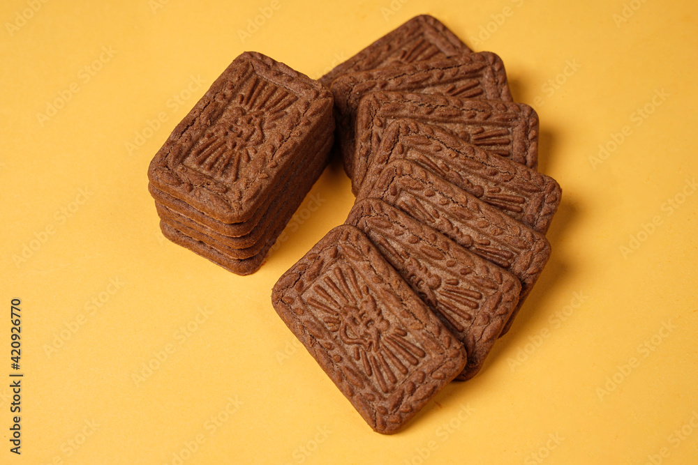 Square-shaped chocolate biscuits are suitable as a side snack to the ...