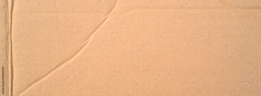 Brown background of paper texture or cardboard surface from a paper box ...