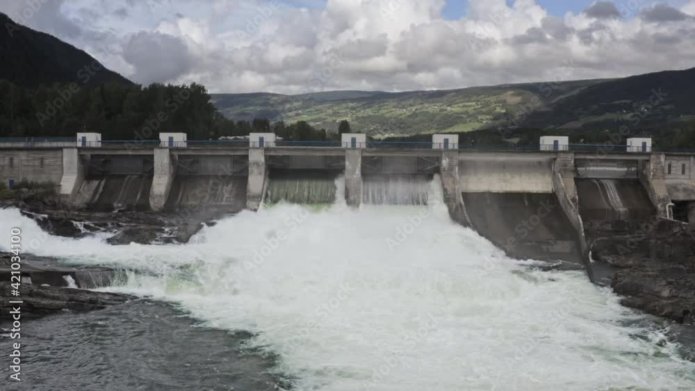 Drone Over Hydroelectric Dam To Tranquil Waters Above Stock Video ...