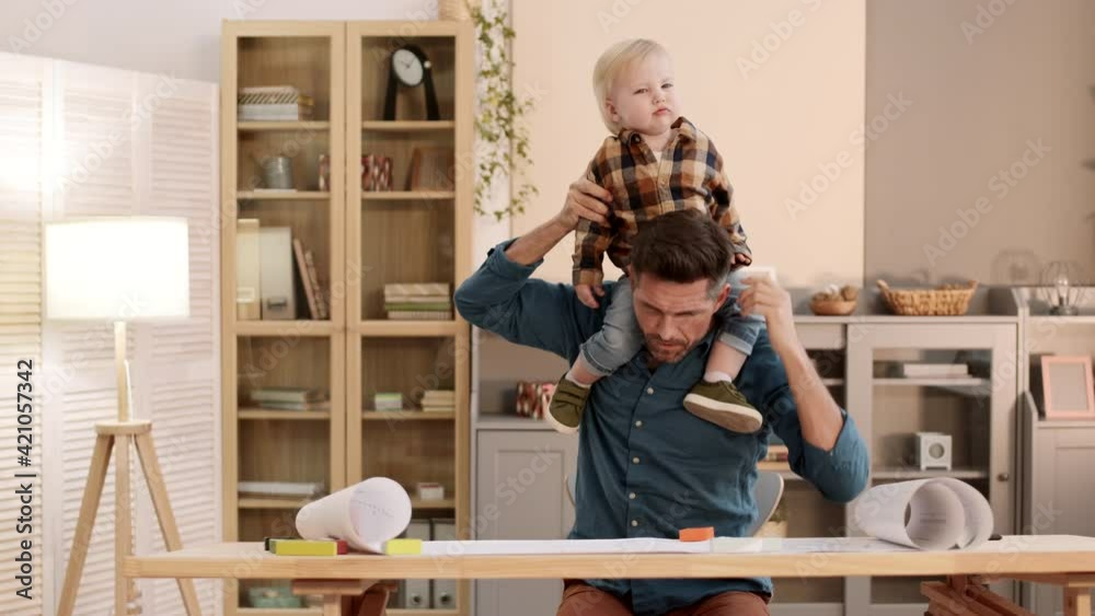 Vídeo do Stock: Medium shot of busy Caucasian man sitting by desk at ...