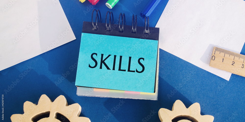 Notes with the word Skills on a blue background. Knowledge and skill ...