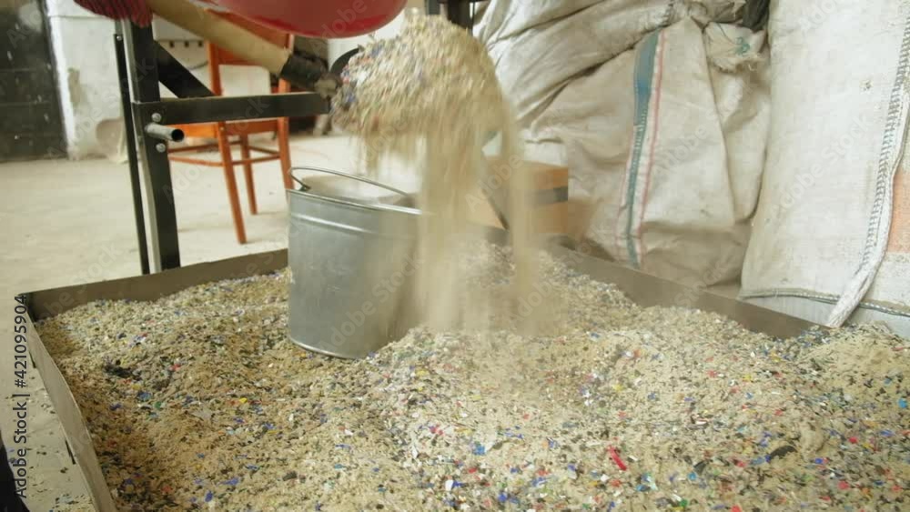 A mixture of plastic and sand to be recycled into something new. New ...