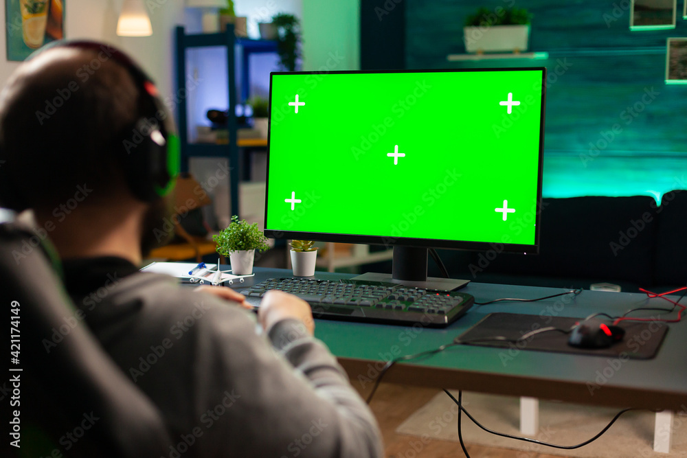 Professional cyber gamer playing digital videogames on powerful ...