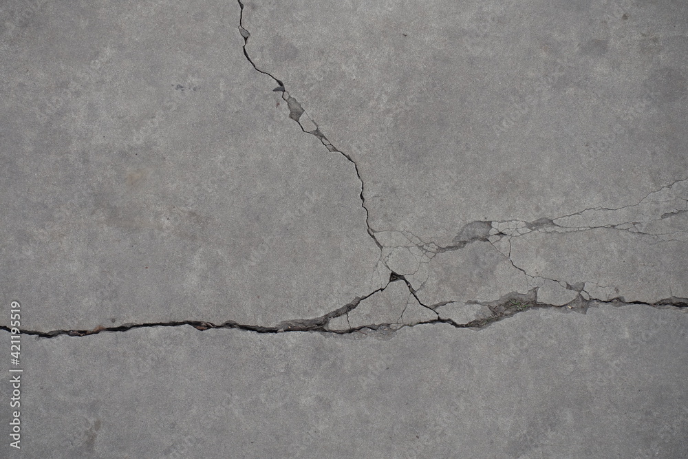 Gray concrete slab with cracks from above Stock Photo | Adobe Stock