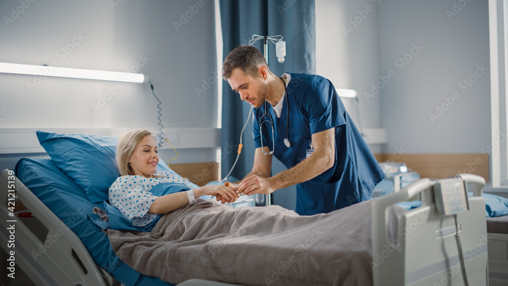 Hospital Ward: Friendly Head Nurse Connects Finger Heart Rate Monitor ...