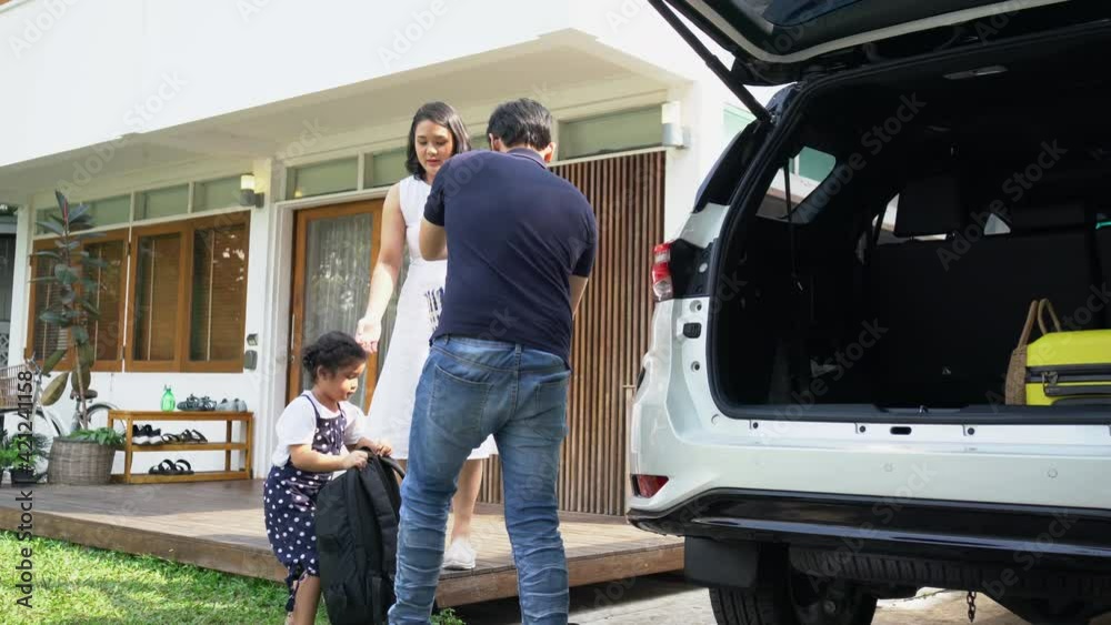 Happy Asian family on road trip vacation. Father and mother with cute ...