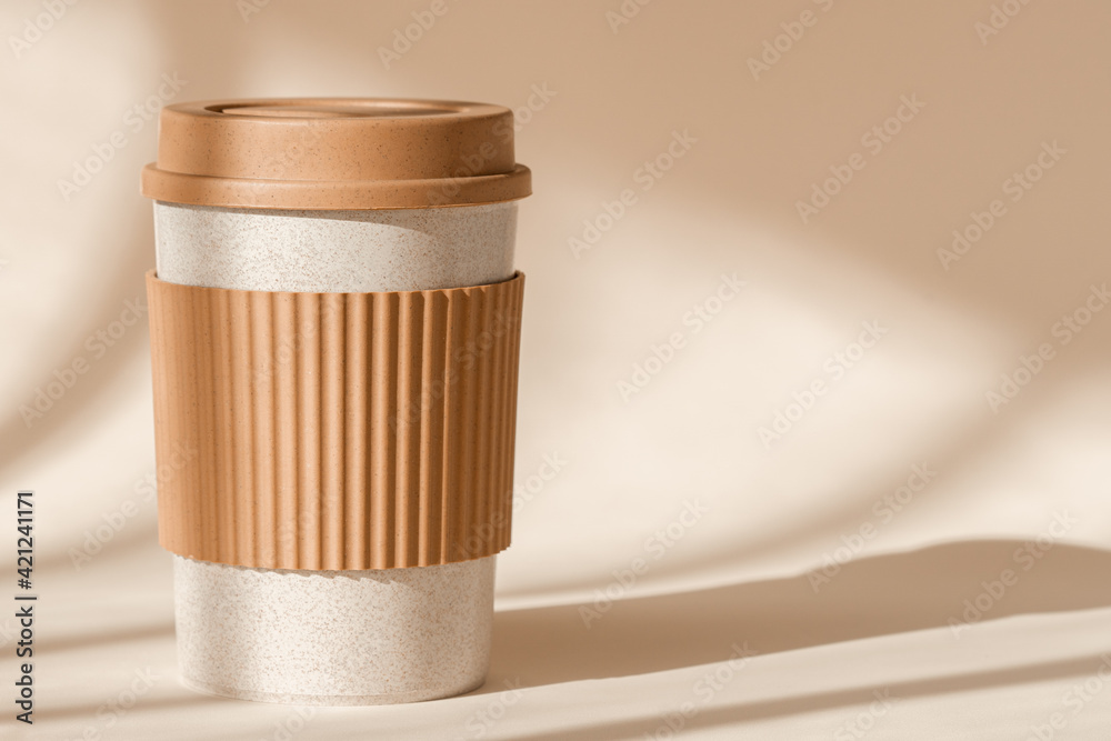 Sustainable bamboo eco friendly cup with silicone holder on natural ...