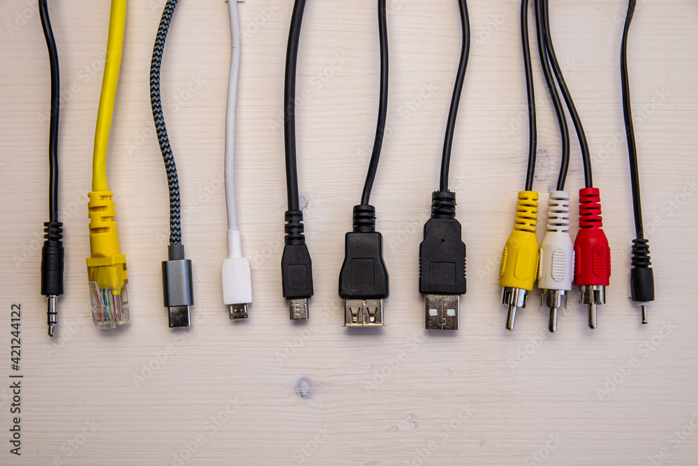 Various types of plugs and cables for audio, video, computer ...