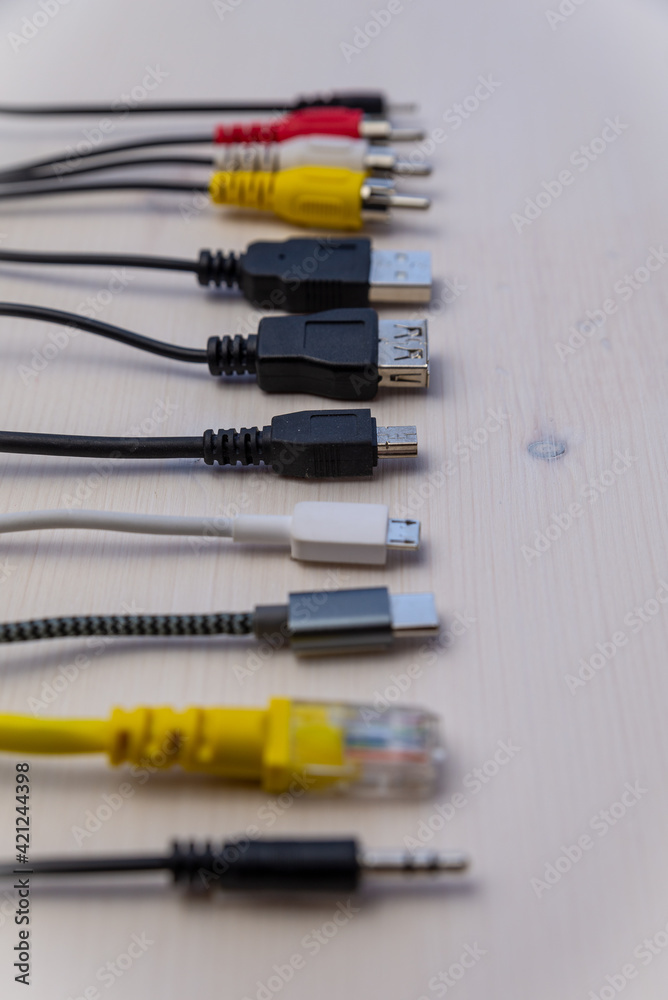Various types of plugs and cables for audio, video, computer ...