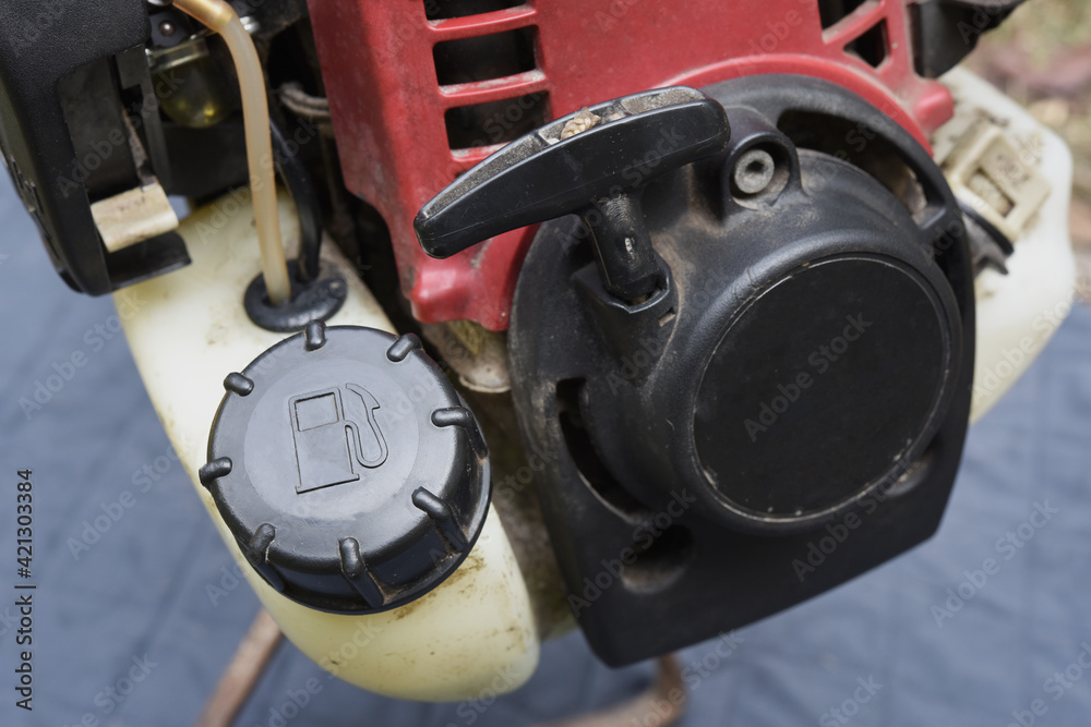 oil filler cap of a small four -stroke engine Stock Photo | Adobe Stock