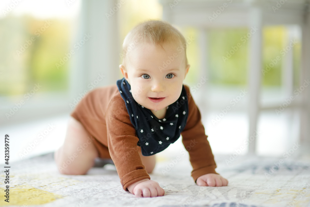 Cute baby boy rocking back and forth on hands and knees. Baby during ...