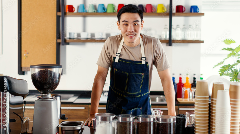 Asian short black hair young successful handsome male barista wear ...