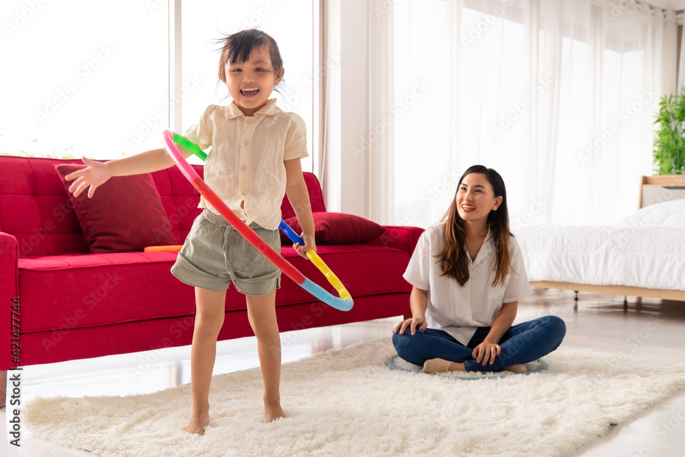 Asian beautiful young long black hair single mom stand smile playing ...