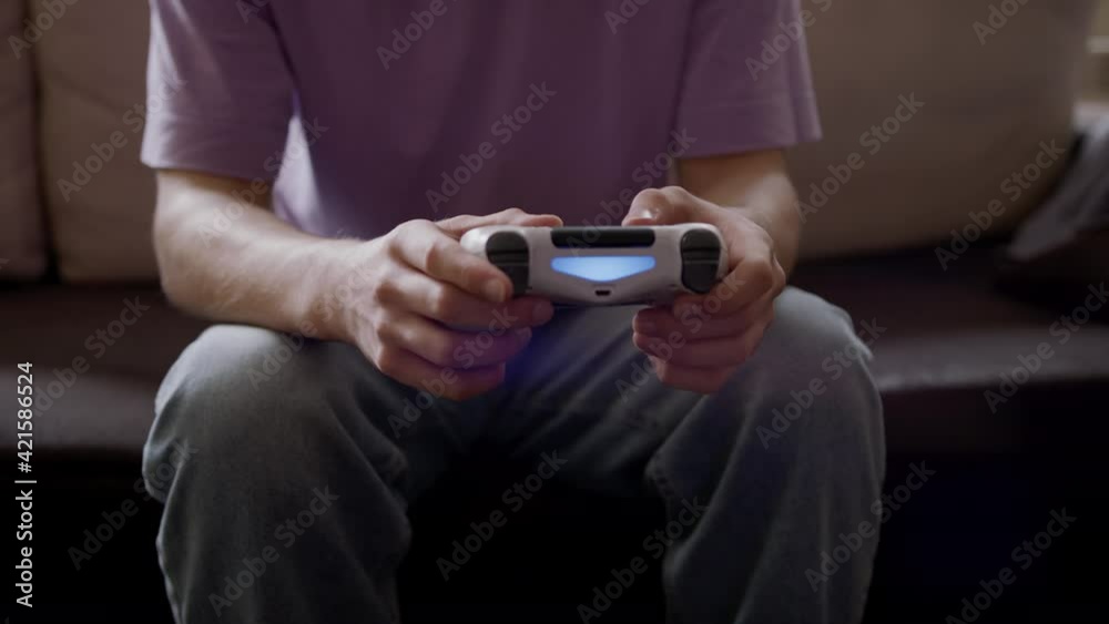 Close-up. Gamer man Sitting on a Couch, Playing and Winning in Video ...