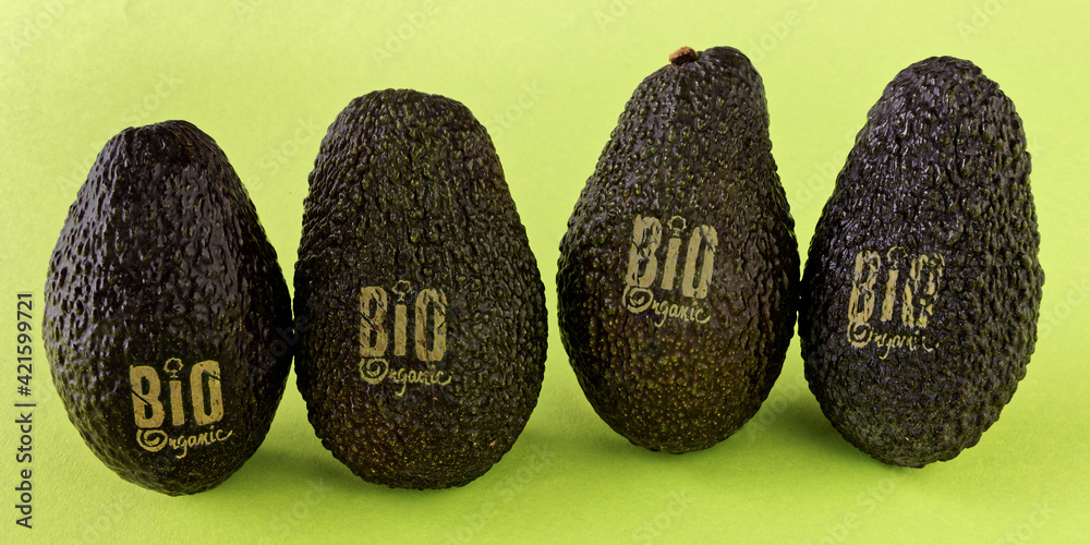 Bio Organic hass avocado fruits with laser labelling. Stock Photo ...
