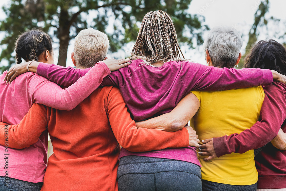 Multi generational women hugging each other outdoor - Multiracial ...