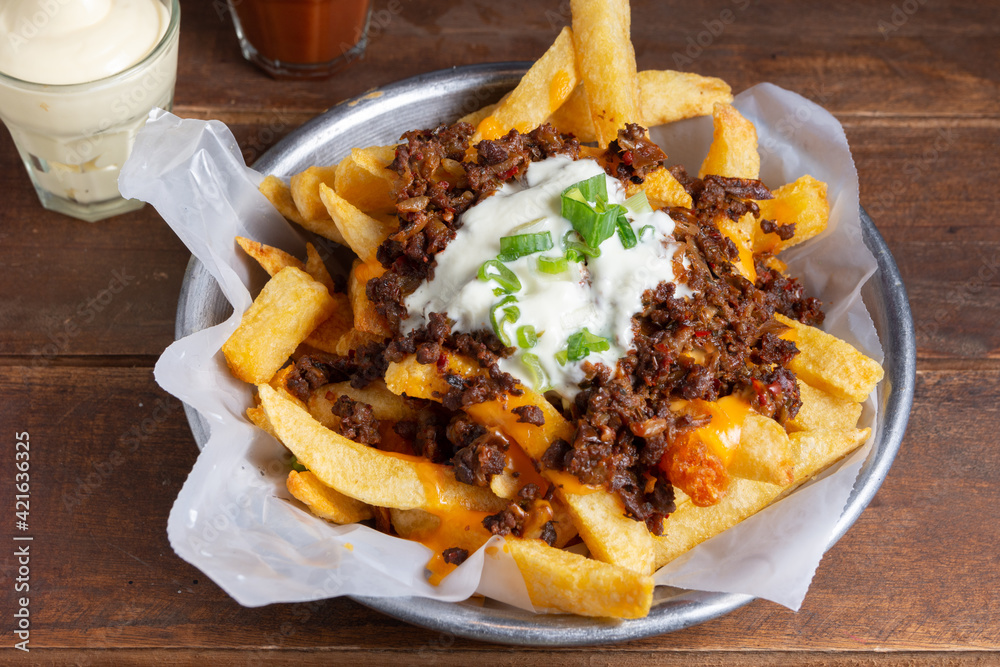 papas fritas con carne Stock Photo | Adobe Stock