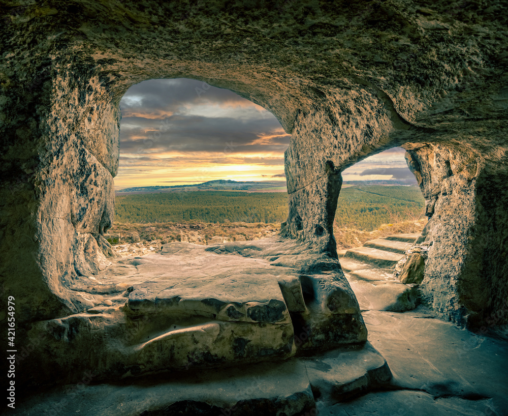 Majestic view of a historical cave from inside with a beautiful nature ...