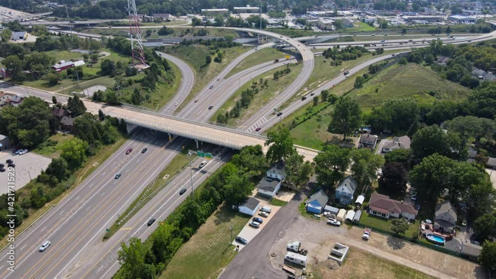 High above highways, interchanges the roads band and the interstate ...