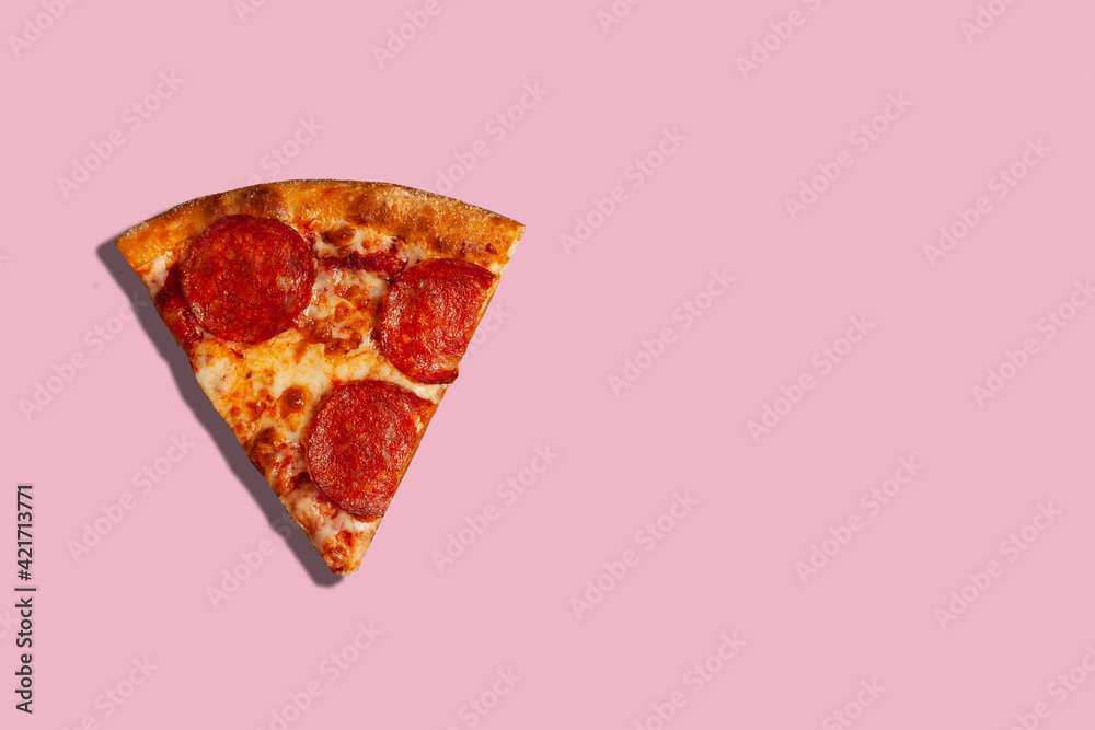 Fresh tasty pepperoni pizza on pastel pink background with copy space ...