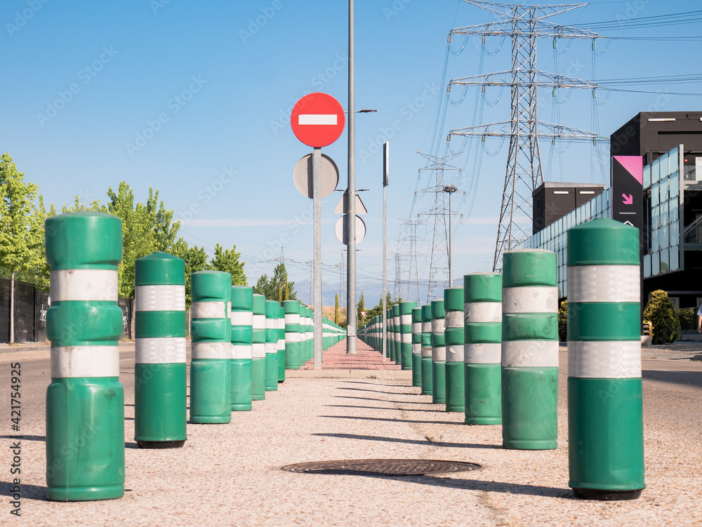 Green H-75 beacons separating the lanes of two highways for safety ...