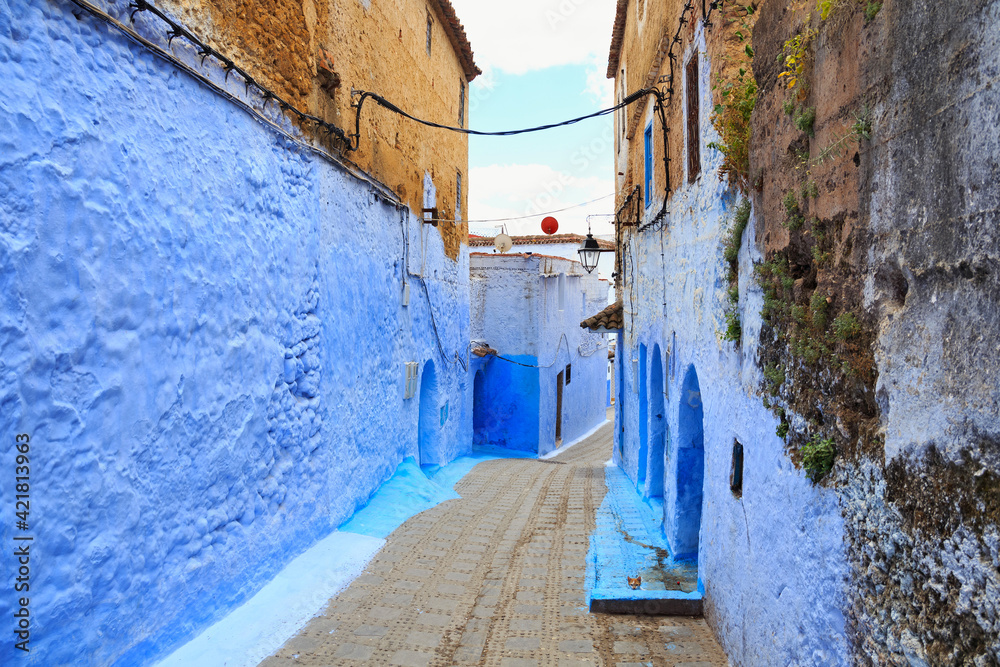View of the blue walls of Medina quarter in Chefchaouen, Morocco. The ...