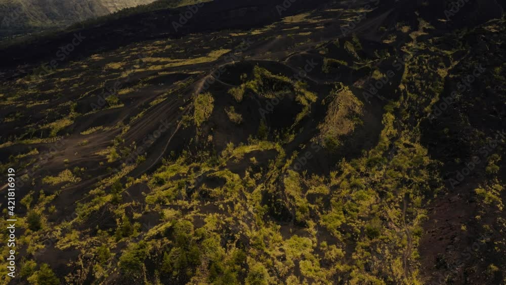 An acidic view of the volcanic land at the foot of an active volcano on ...