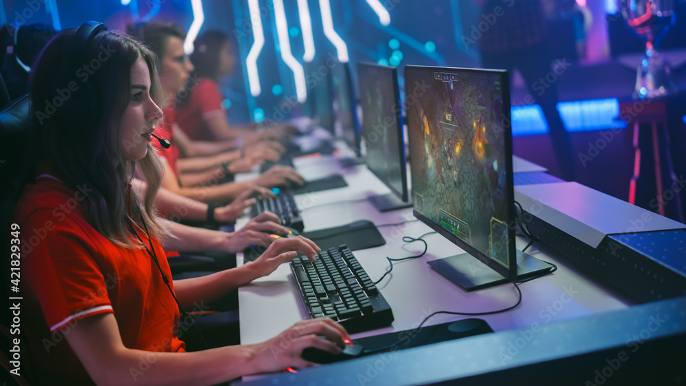 Pro Girl Plays Computer Game Plays RPG Strategy on a Championship ...