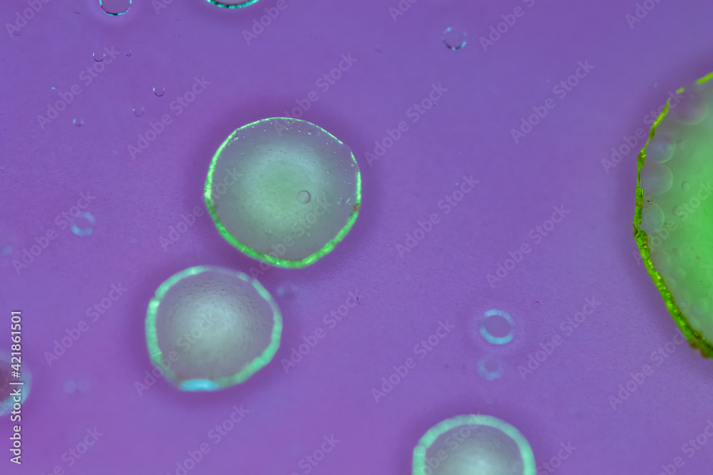 abstract chemistry background bubbles. Fluorescent liquid bubbles on ...