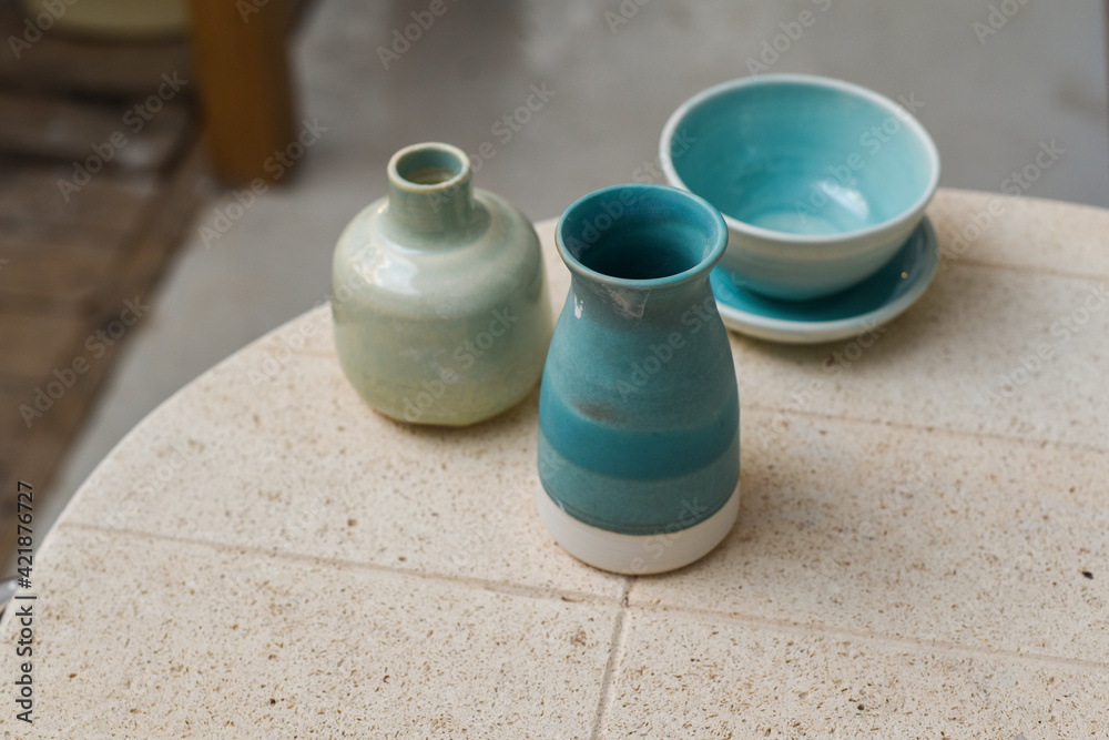 Collection of finished ceramics products made from clay by hand ...