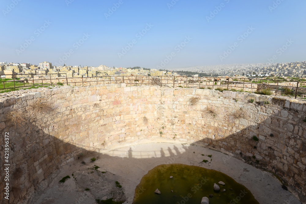 Huge water reservoir dug in the Citadel in Amman, Jordan. Ancient water ...