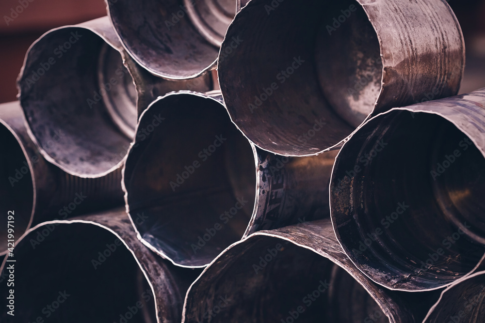 pyramid of old opened rusty cans Stock Photo | Adobe Stock