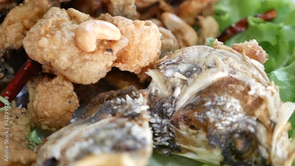 Close Up Footage of Thai Style Deep Fried Fish Served With Palm Sugar ...